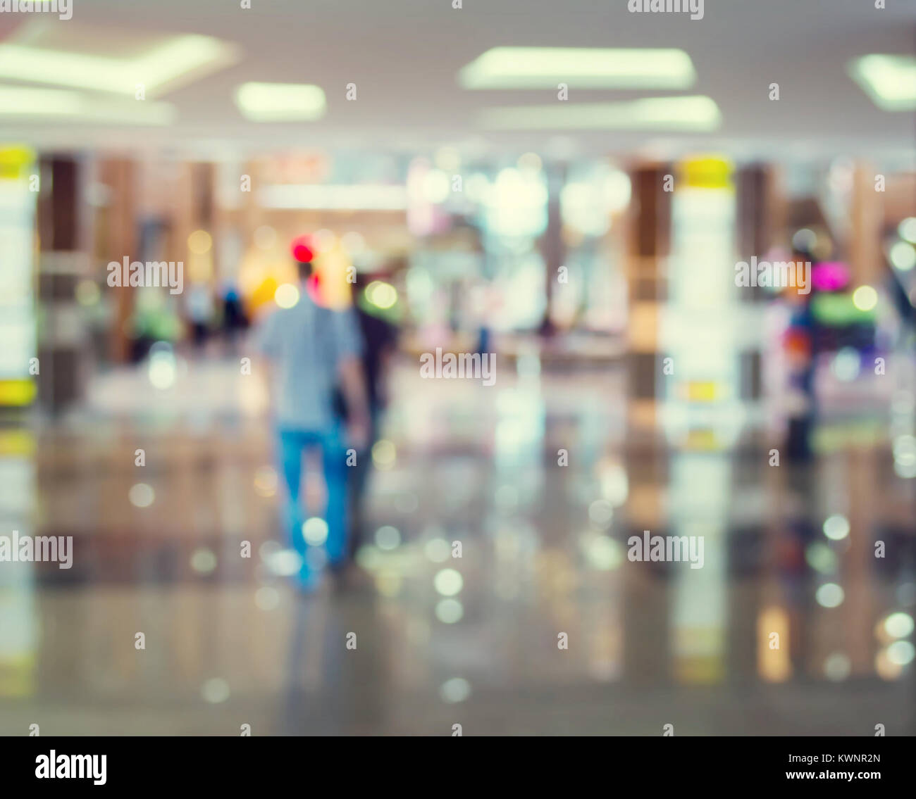 Blurred Background: people go for Shopping Mall along the window Stock ...