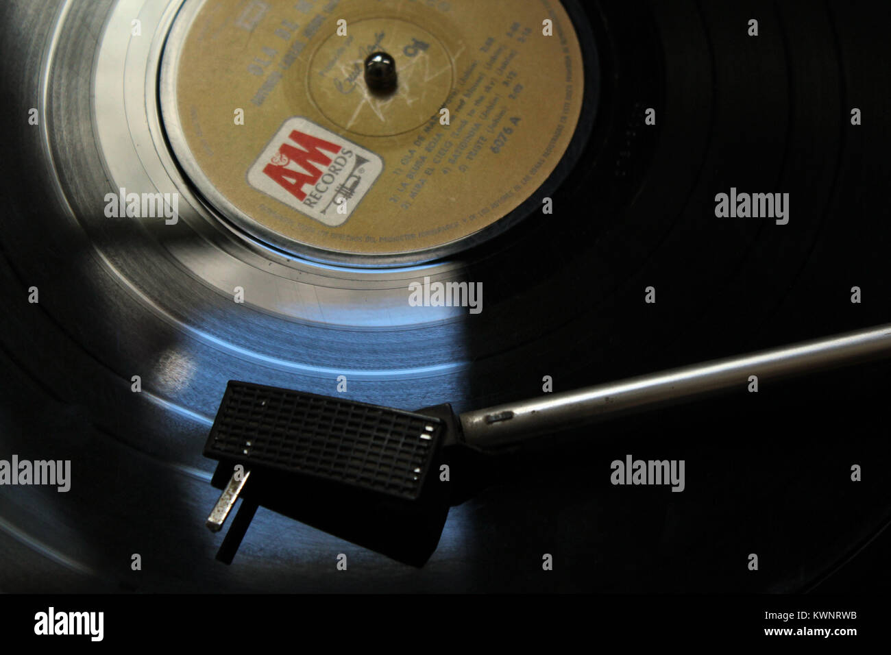 Vinyl record on turntable detail Stock Photo - Alamy