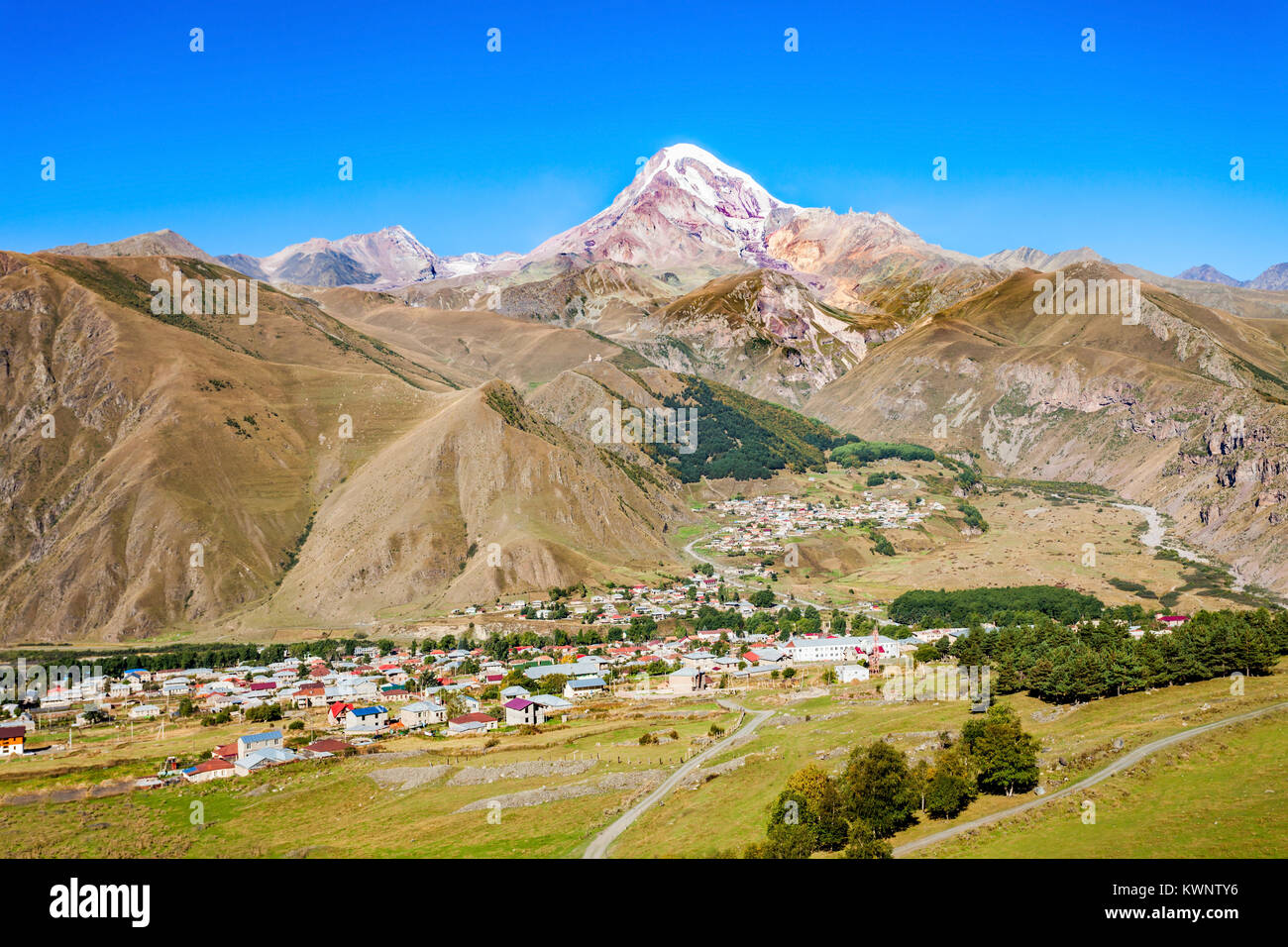 Mount Kazbek and Stepantsminda town in Georgia Stock Photo - Alamy