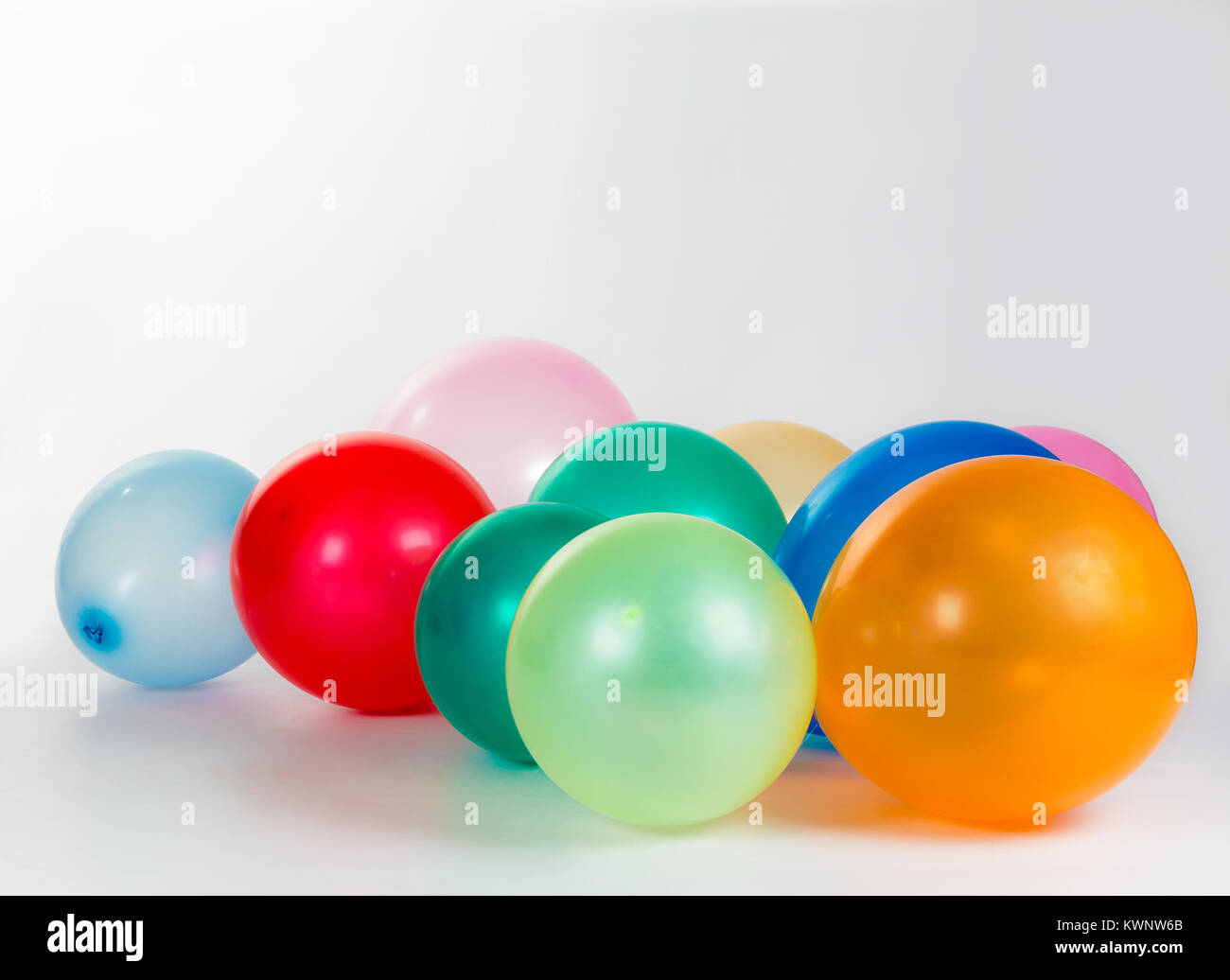 Colorful balloons of diferent colors on white background Stock Photo ...