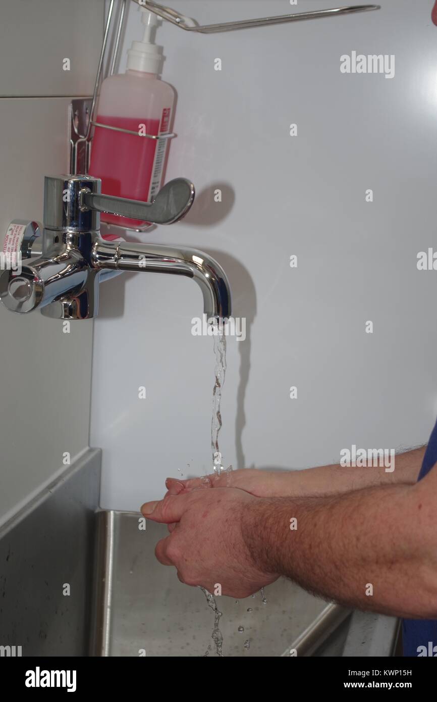 Surgeon Washing Hands in Modern British Hospital Operating Theatre ...