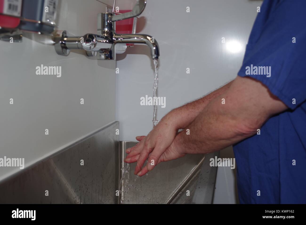 Surgeon Washing Hands in Modern British Hospital Operating Theatre ...