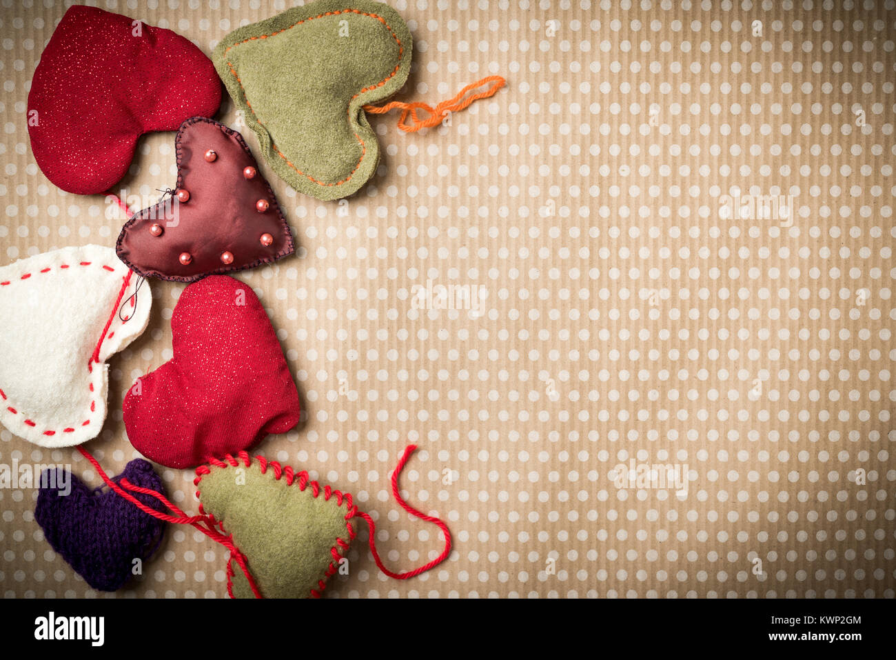 Colorful knitted hearts Stock Photo - Alamy