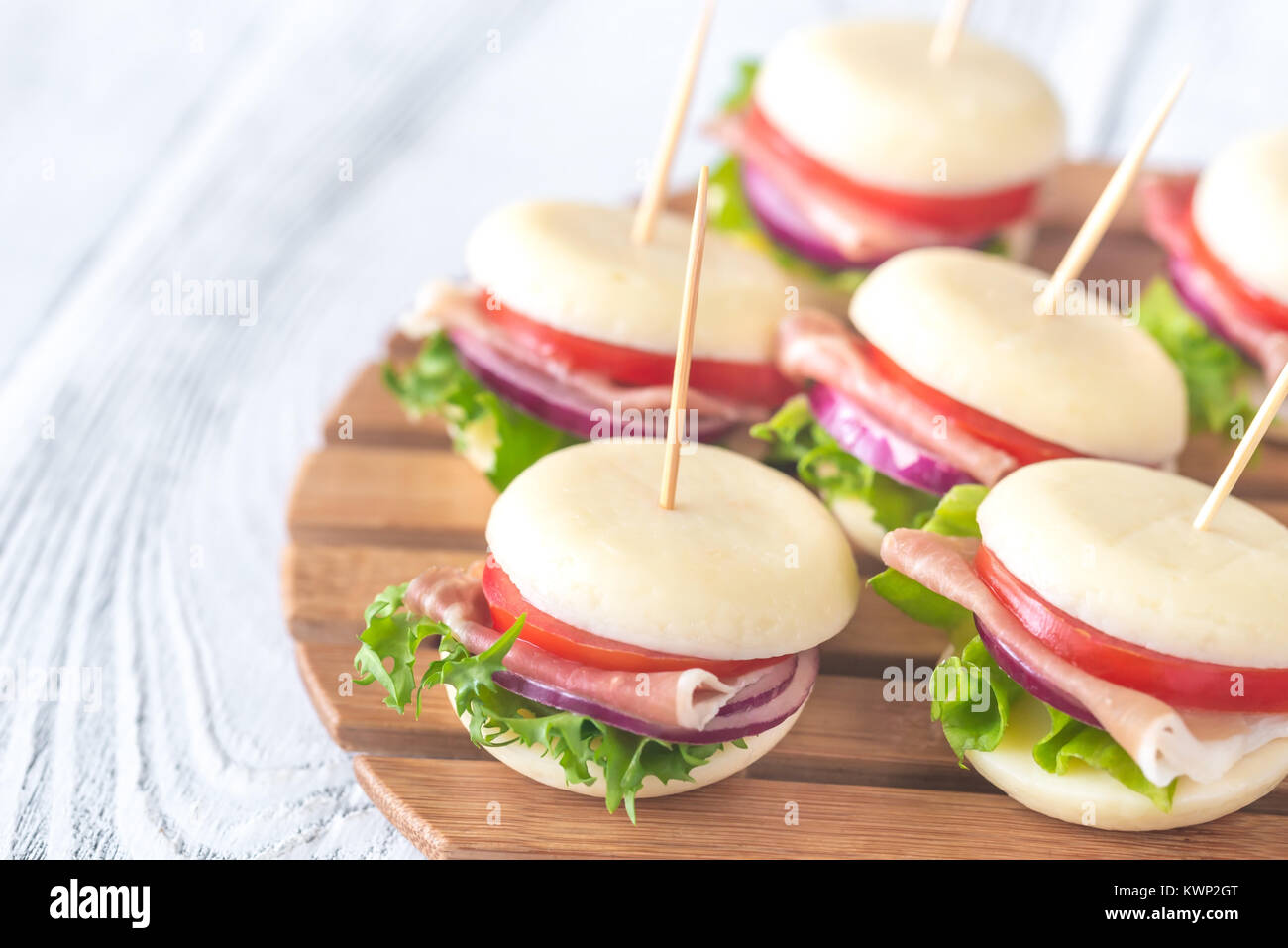 Mini cheese and prosciutto sandwiches Stock Photo - Alamy