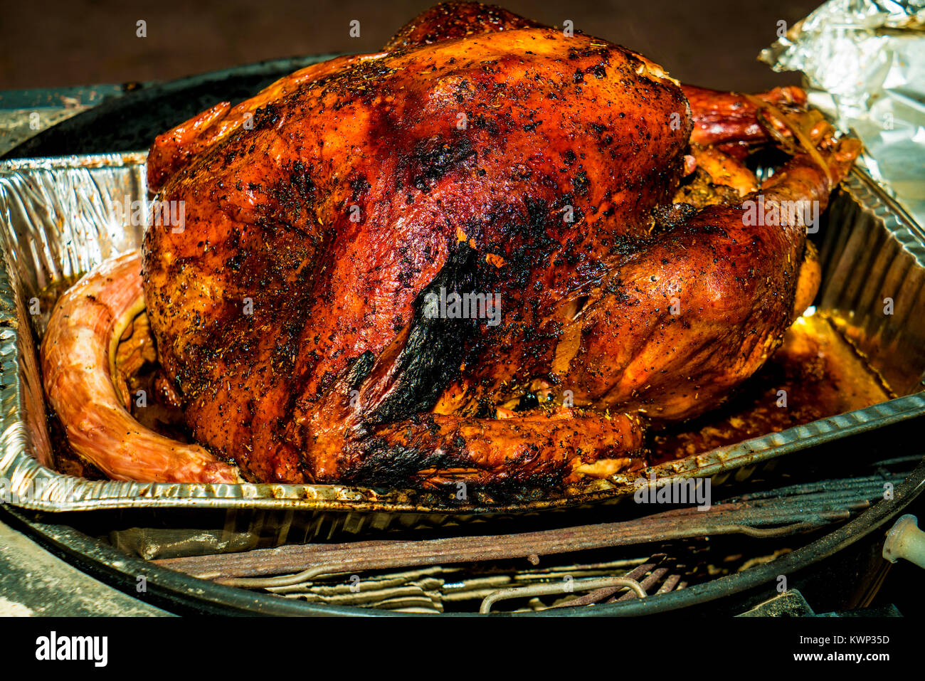 Turkey roasted on an outdoor grill Stock Photo - Alamy