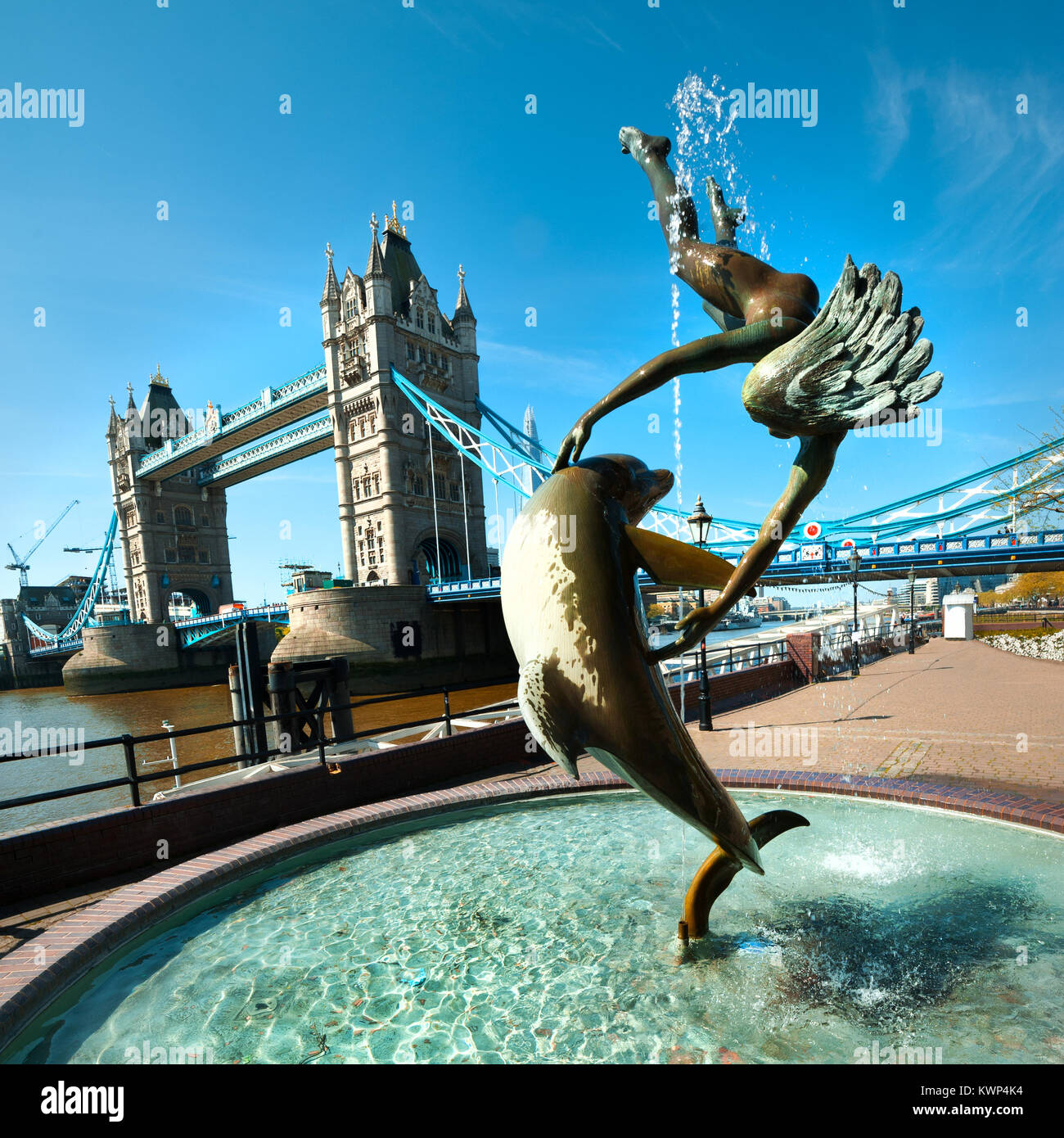 Dolphin and boy statue hi-res stock photography and images - Alamy