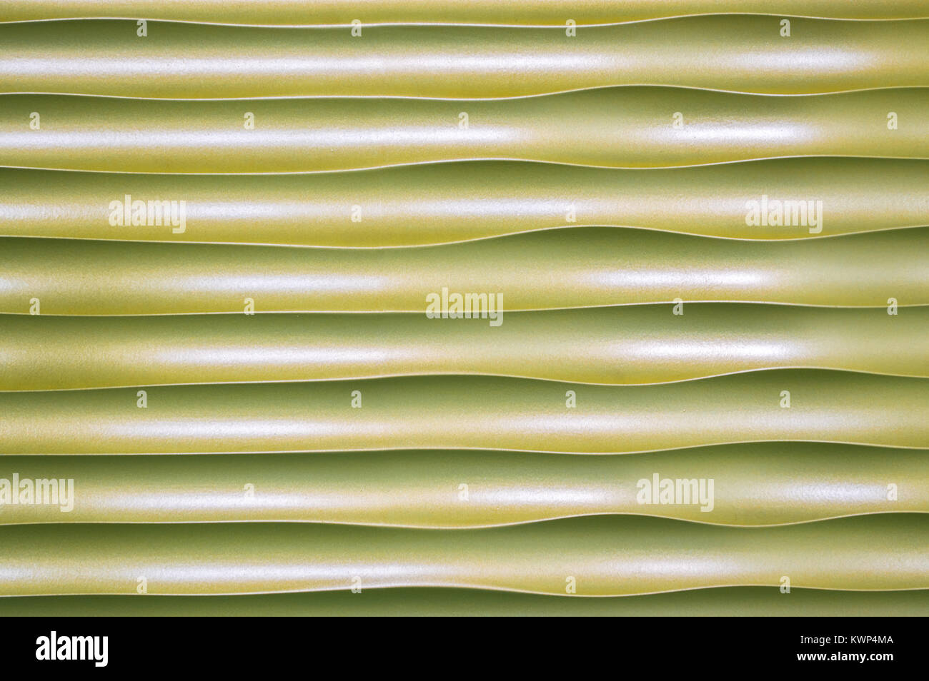 background texture full frame close up of golden undulating metal with ...