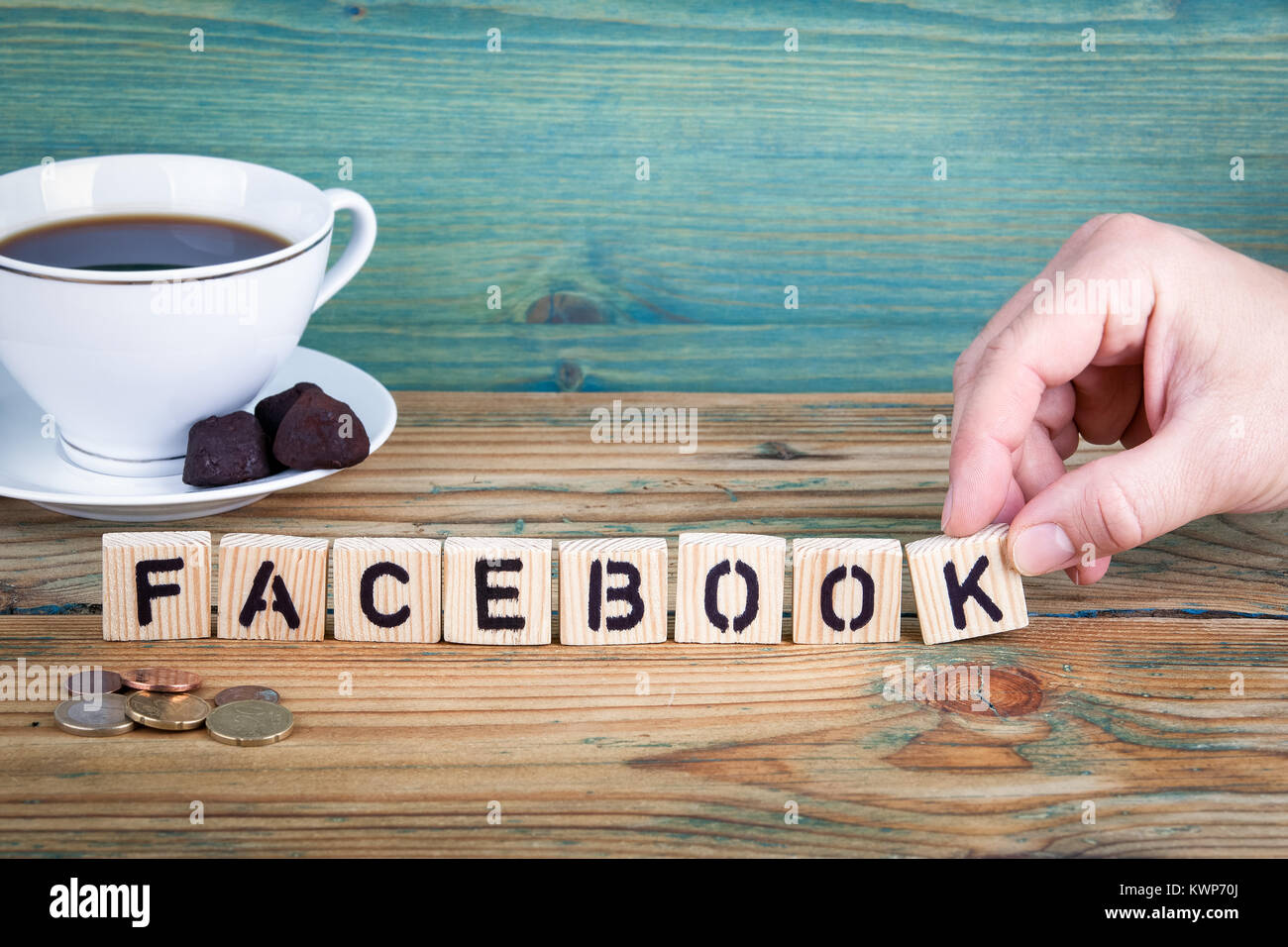 facebook. Wooden letters on the office desk, informative and ...