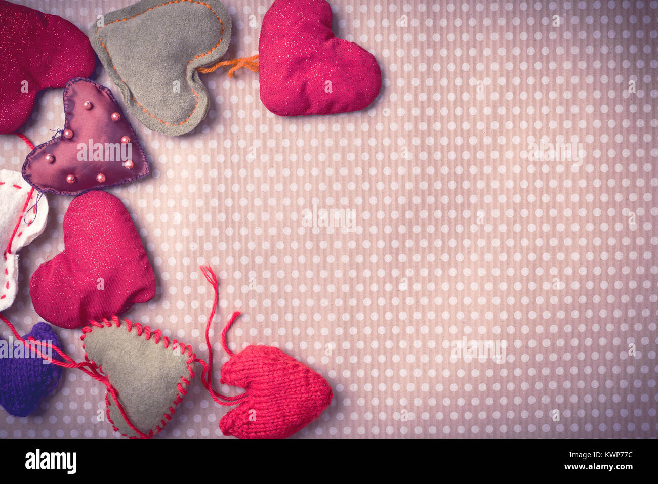 Colorful knitted hearts Stock Photo - Alamy