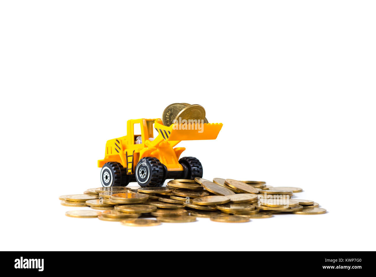 Mini bulldozer truck loading stack coin with pile of gold coin ...