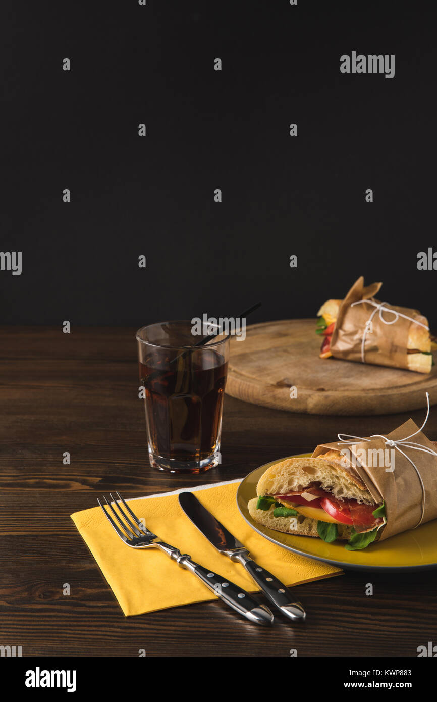 cooked panini on wooden board and plate Stock Photo - Alamy