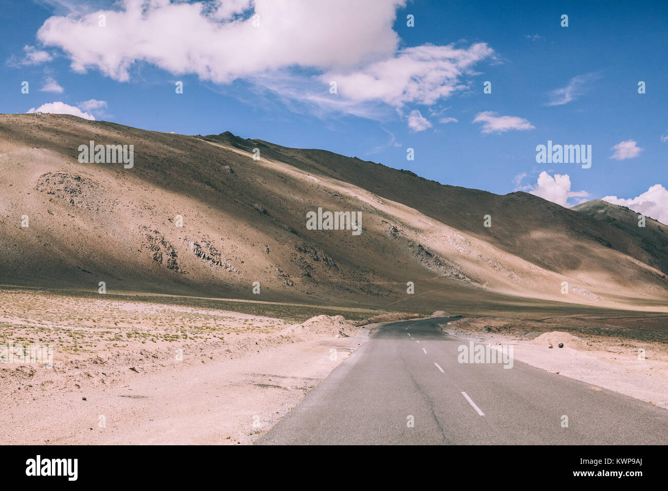 empty asphalt road in mountain valley in Indian Himalayas Stock Photo ...