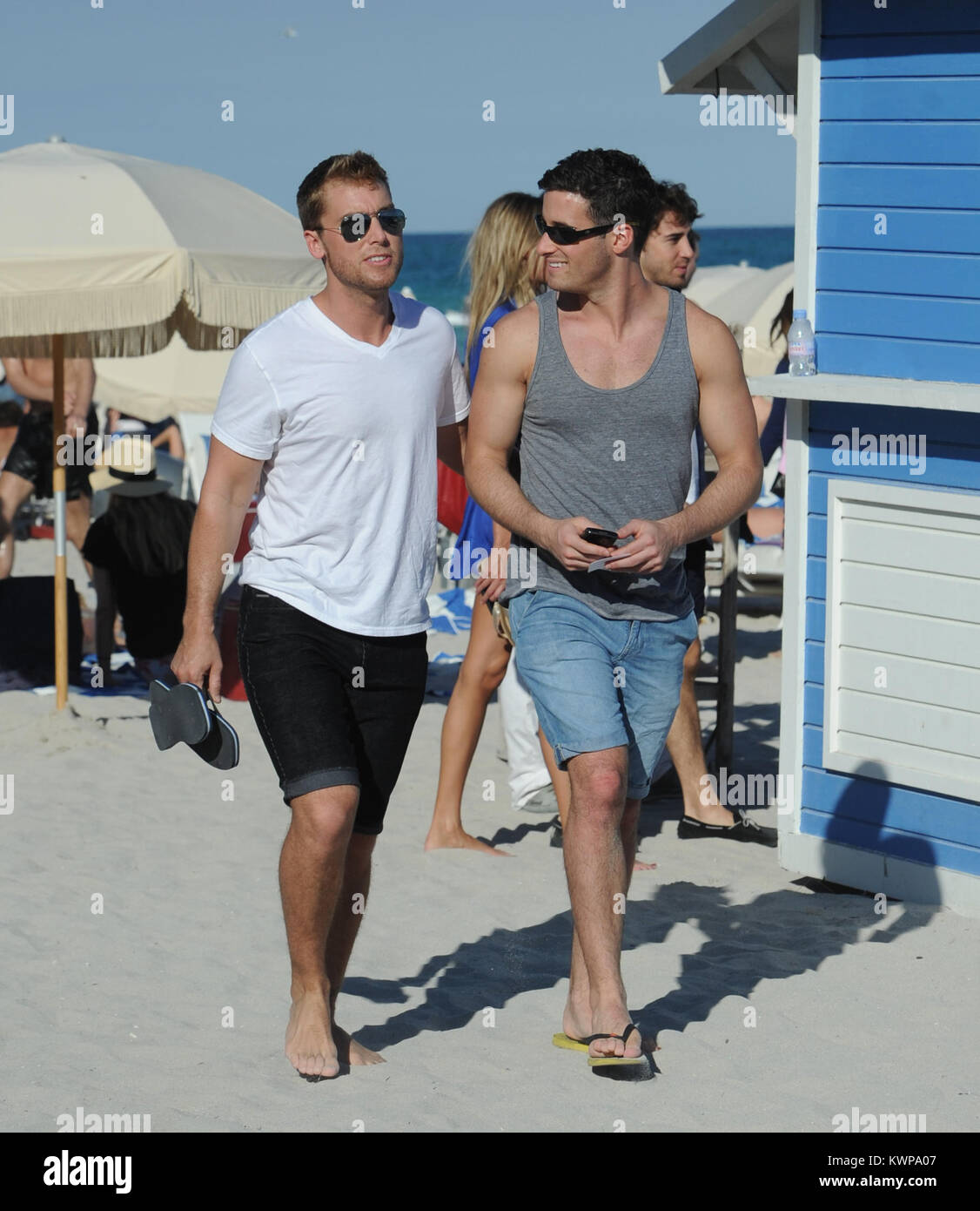 MIAMI BEACH, FL - DECEMBER 31: Lance Bass hanging with his boy ...