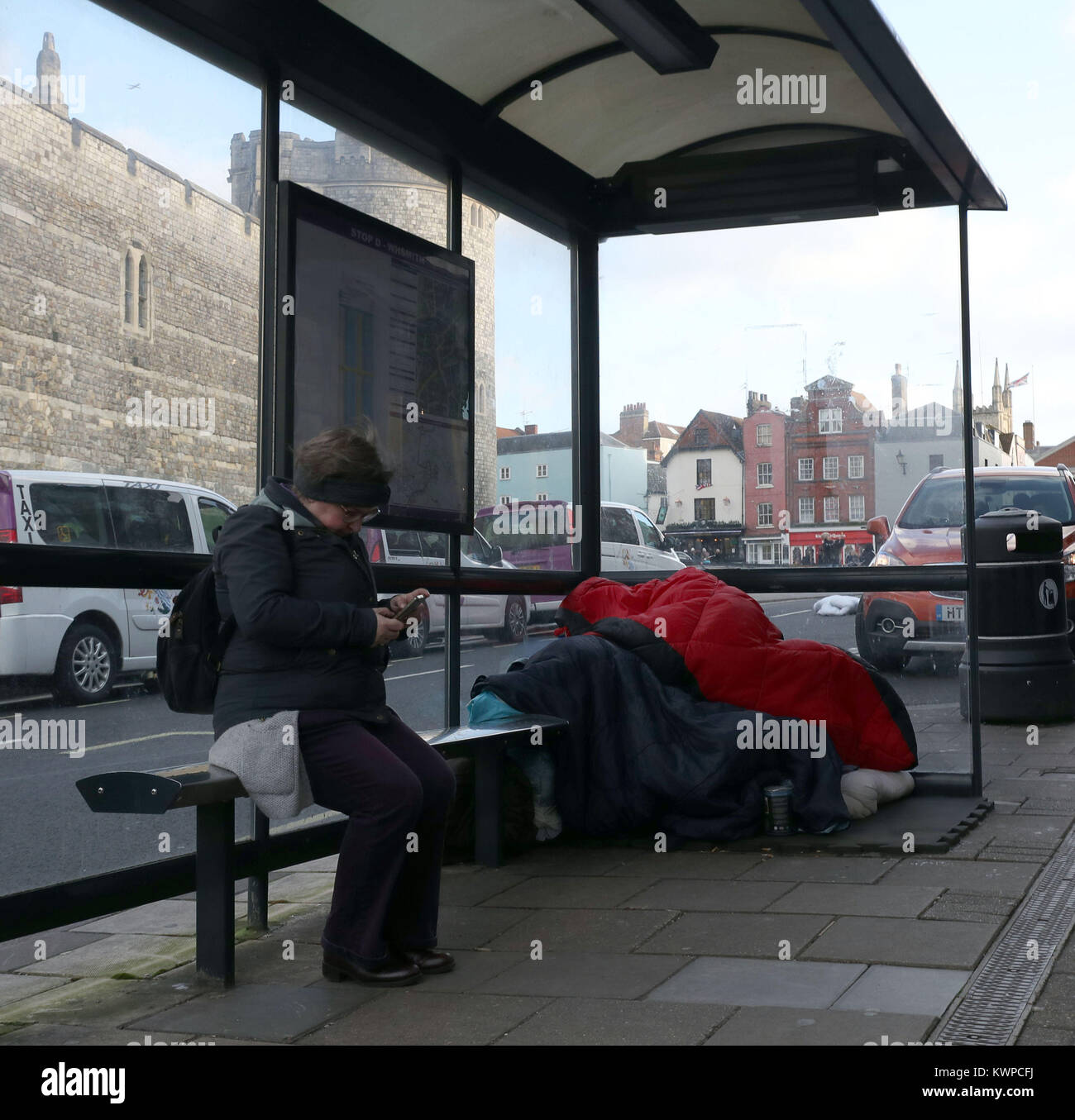 A homeless person sleeps rough near Windsor Castle, Berkshire. Prime ...
