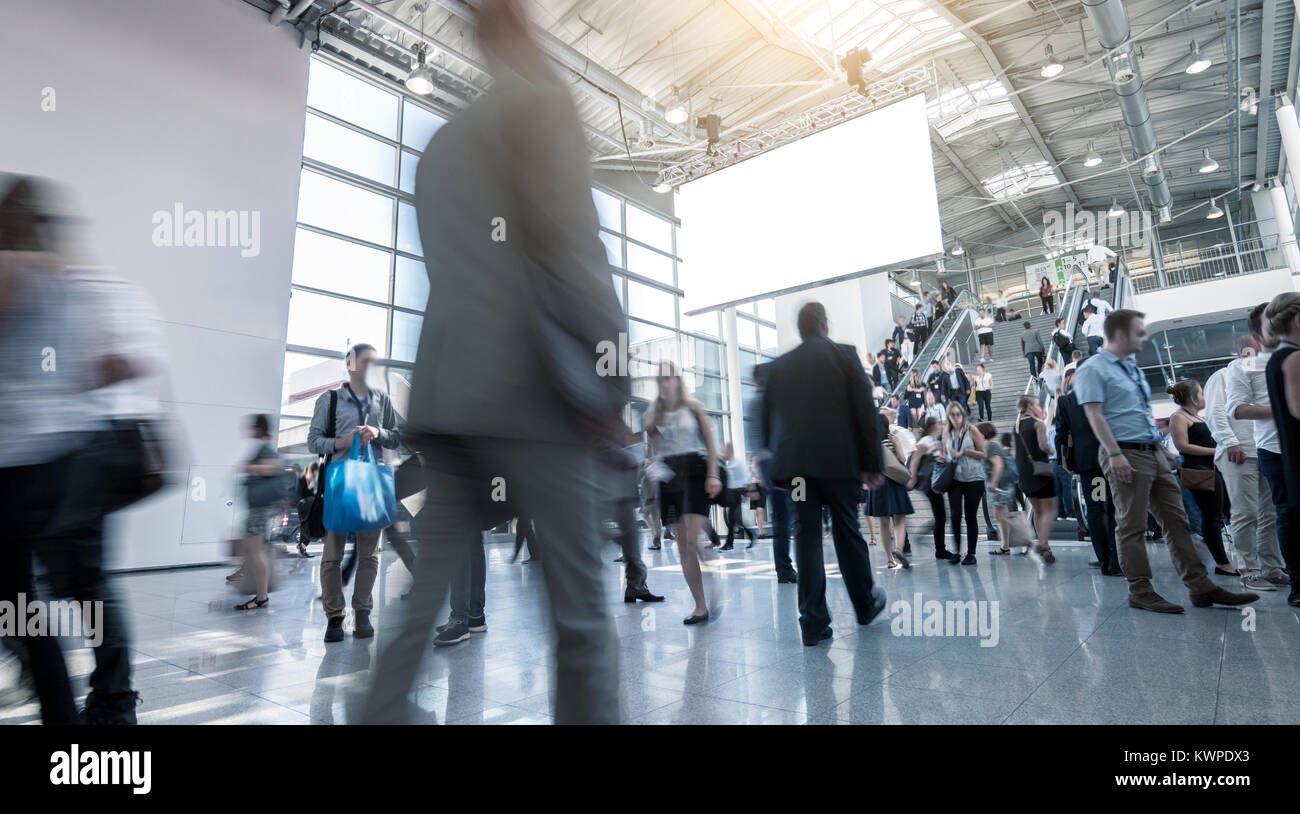 businesspeople walking International Trade Fair & Conference Stock ...