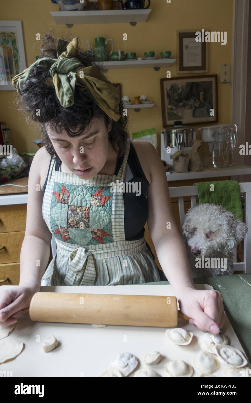 Polish American woman makes pierogi for soup for traditional Christmas ...