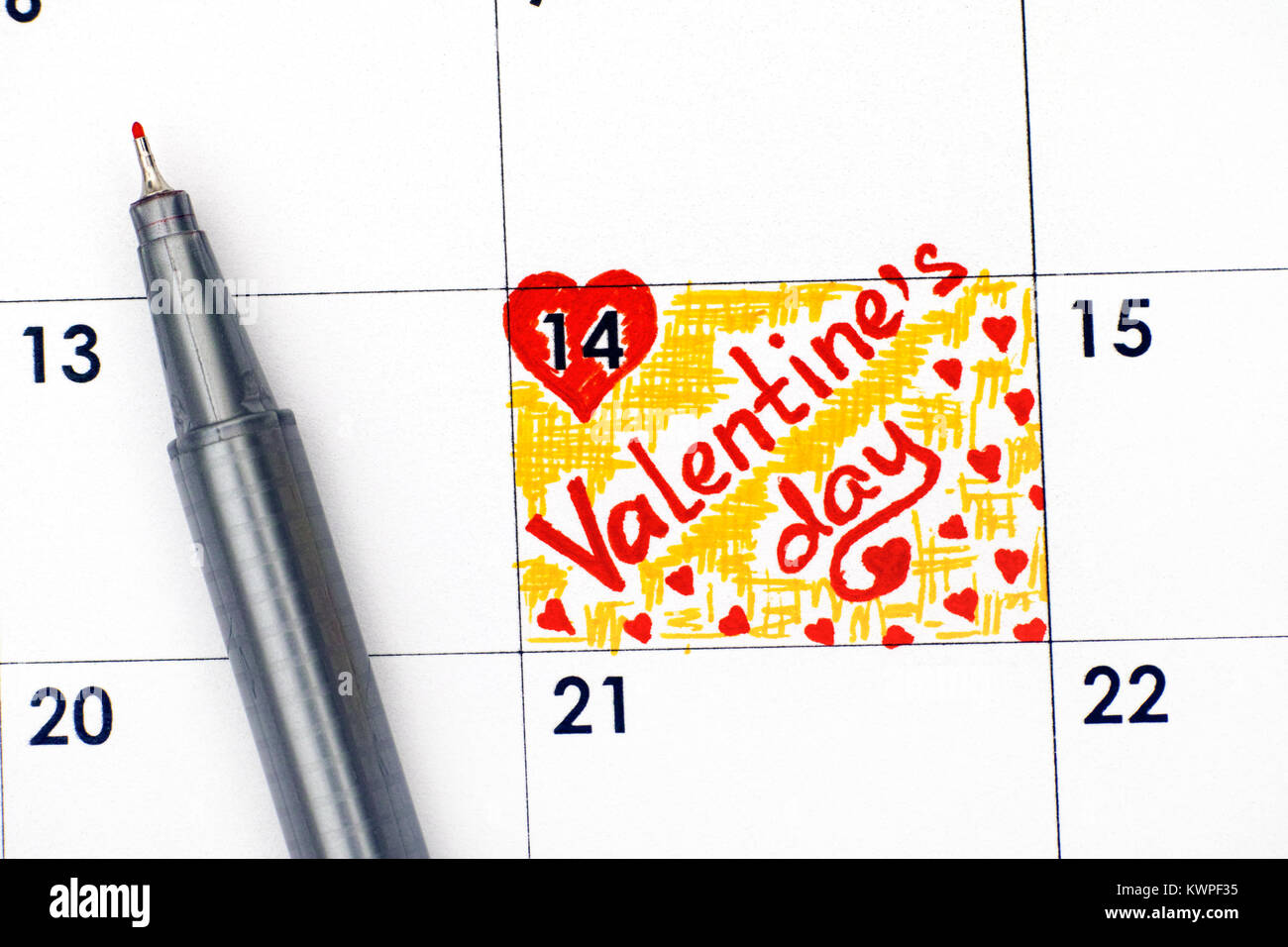 Reminder Valentine`s Day in calendar with red pen. Close-up Stock Photo ...