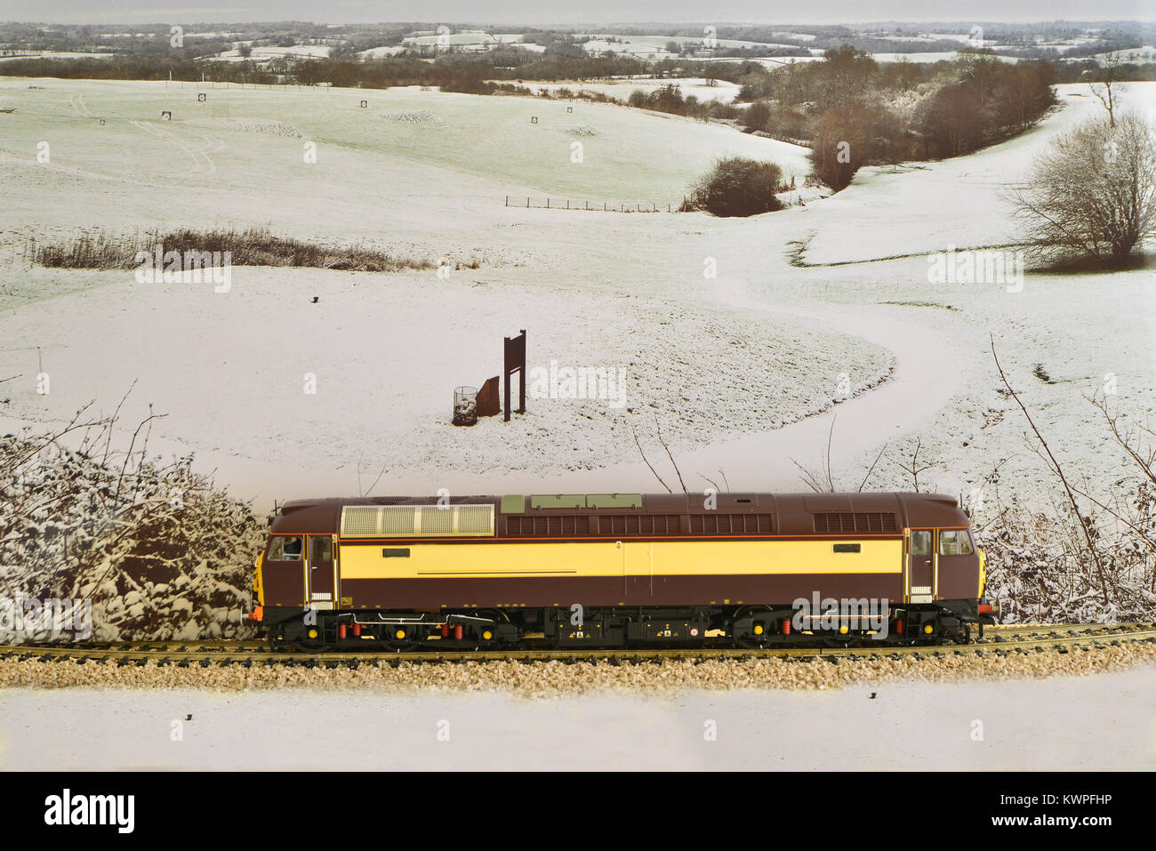 A model of a diesel locomotive set in a snowy winter backdrop Stock ...