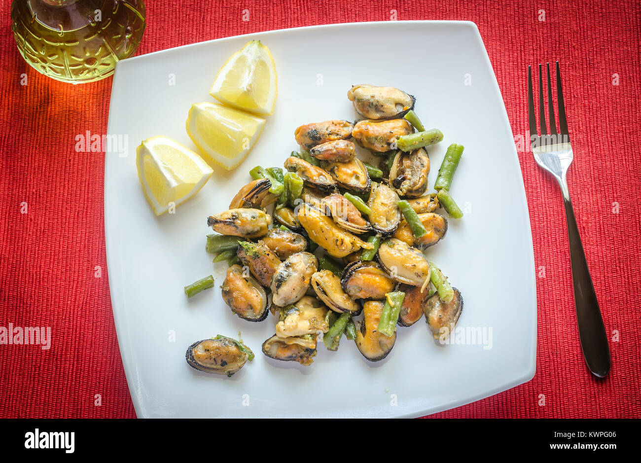 Fried mussels on the pan Stock Photo - Alamy
