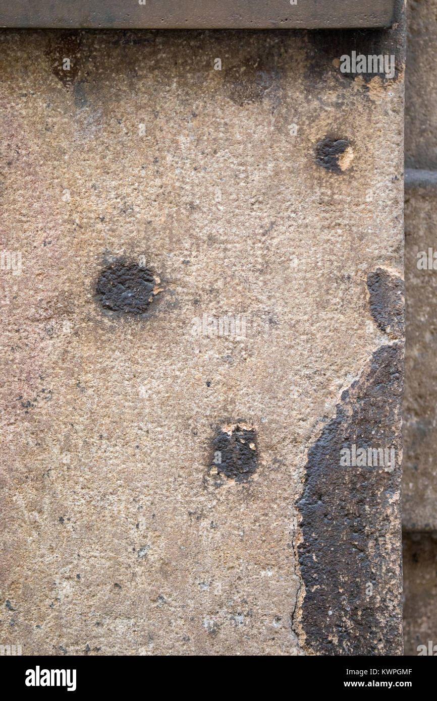 A close-up view of bullet holes and shrapnel damage sustained during ...