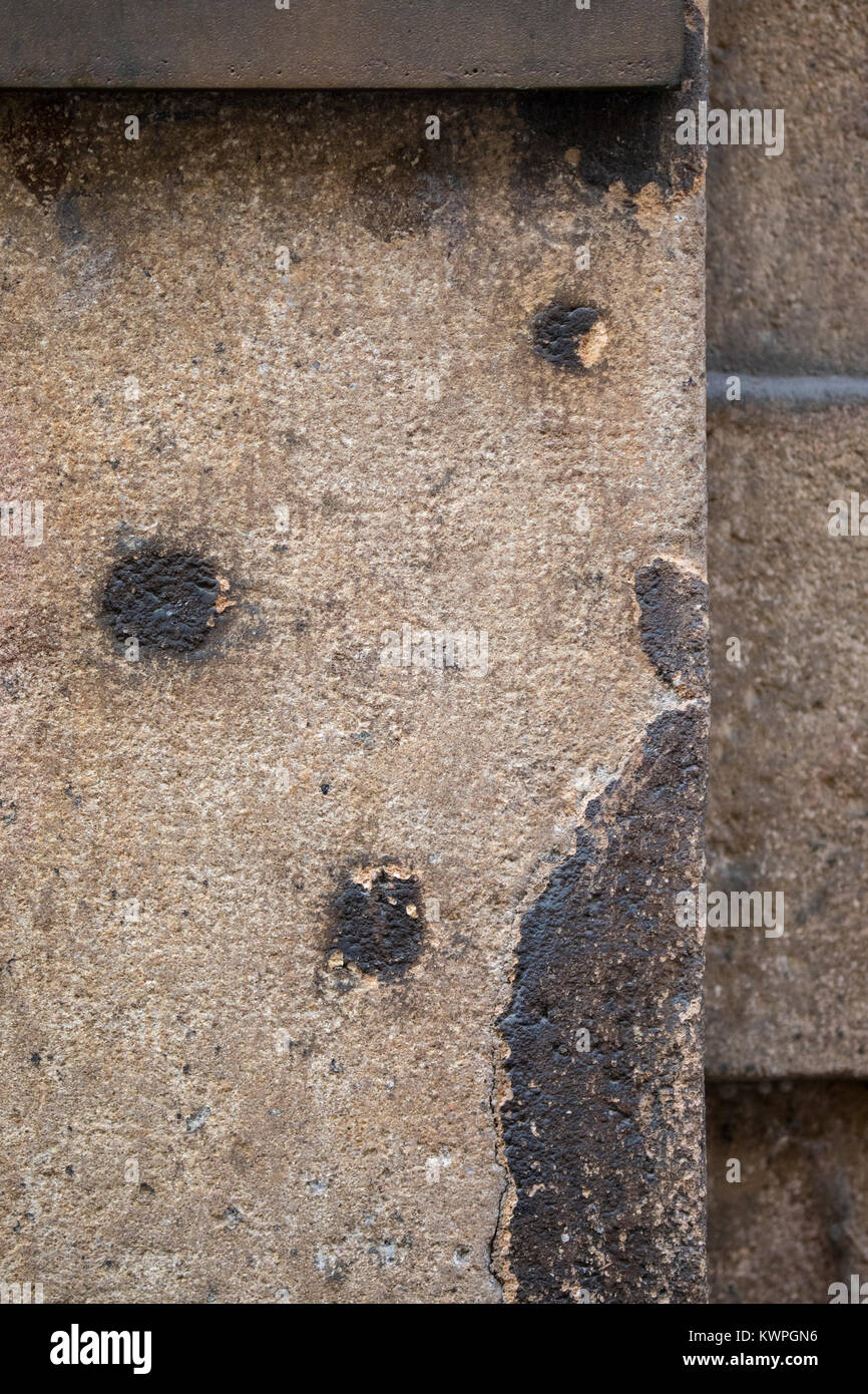 A close-up view of bullet holes and shrapnel damage sustained during ...