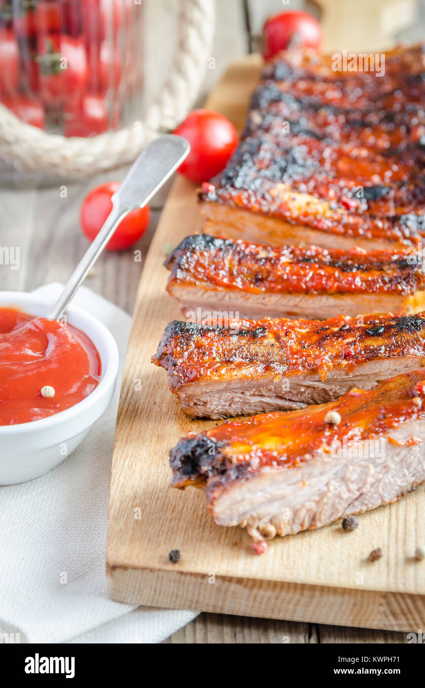Grilled pork ribs in barbecue sauce Stock Photo - Alamy