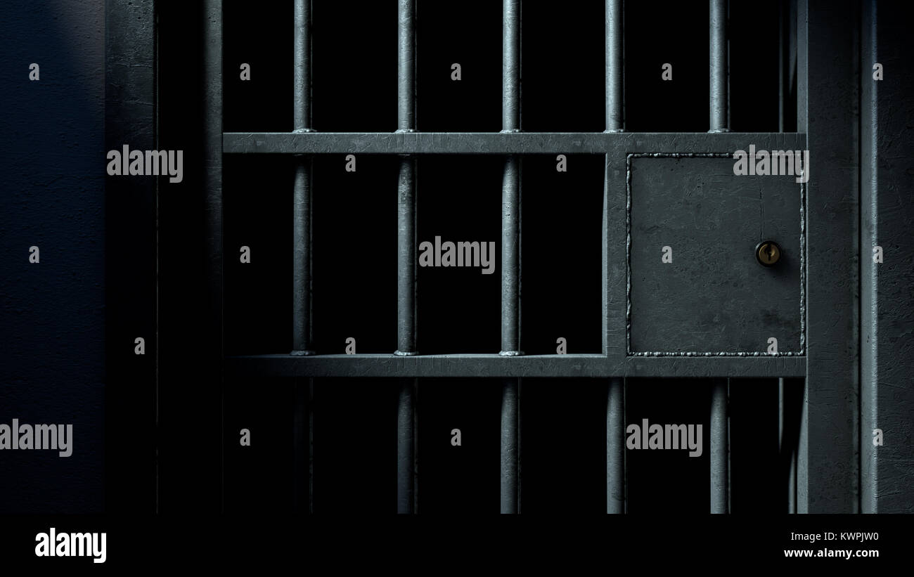 A closeup of the locking mechanism of a closed jail cell with welded iron bars on a dimly lit ...