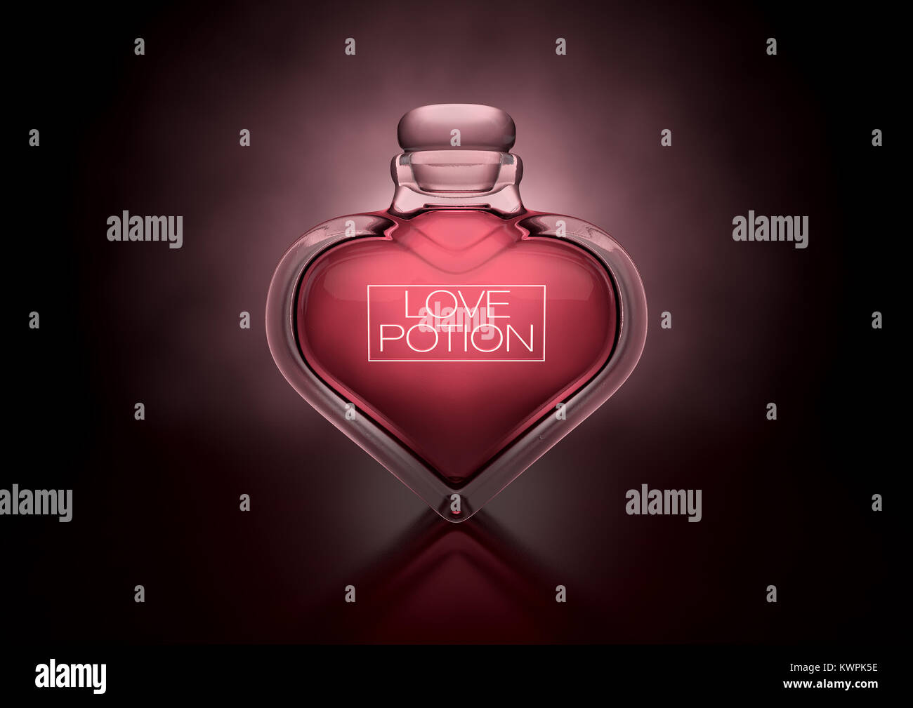 A love concept showing a heart shaped glass bottle containing a red ...