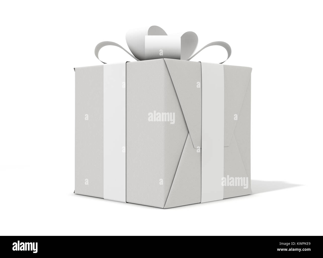 A cube shaped gift wrapped in white wrapping paper and bound with a ...