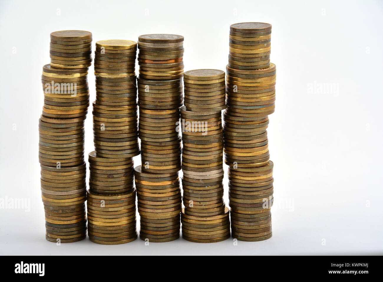 Heap of coins isolated on white background Stock Photo - Alamy