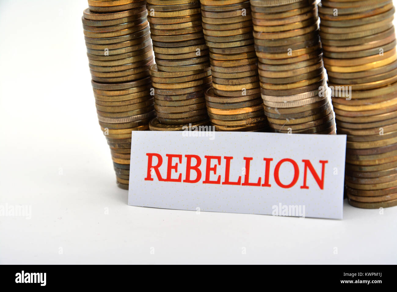 Word rebellion with coins isolated on white background Stock Photo - Alamy