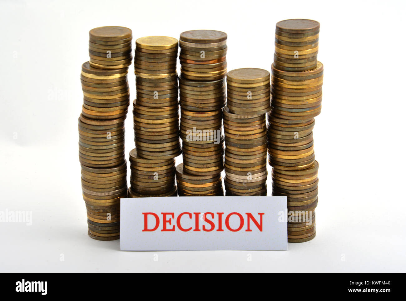 Word decision with coins isolated on white background Stock Photo - Alamy