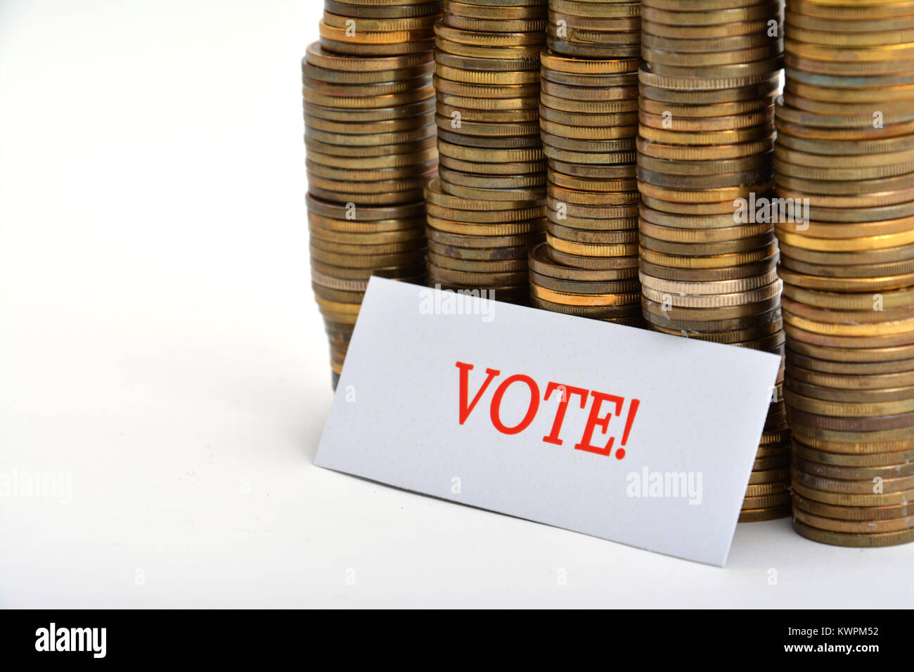 Word vote with coins isolated on white background Stock Photo - Alamy