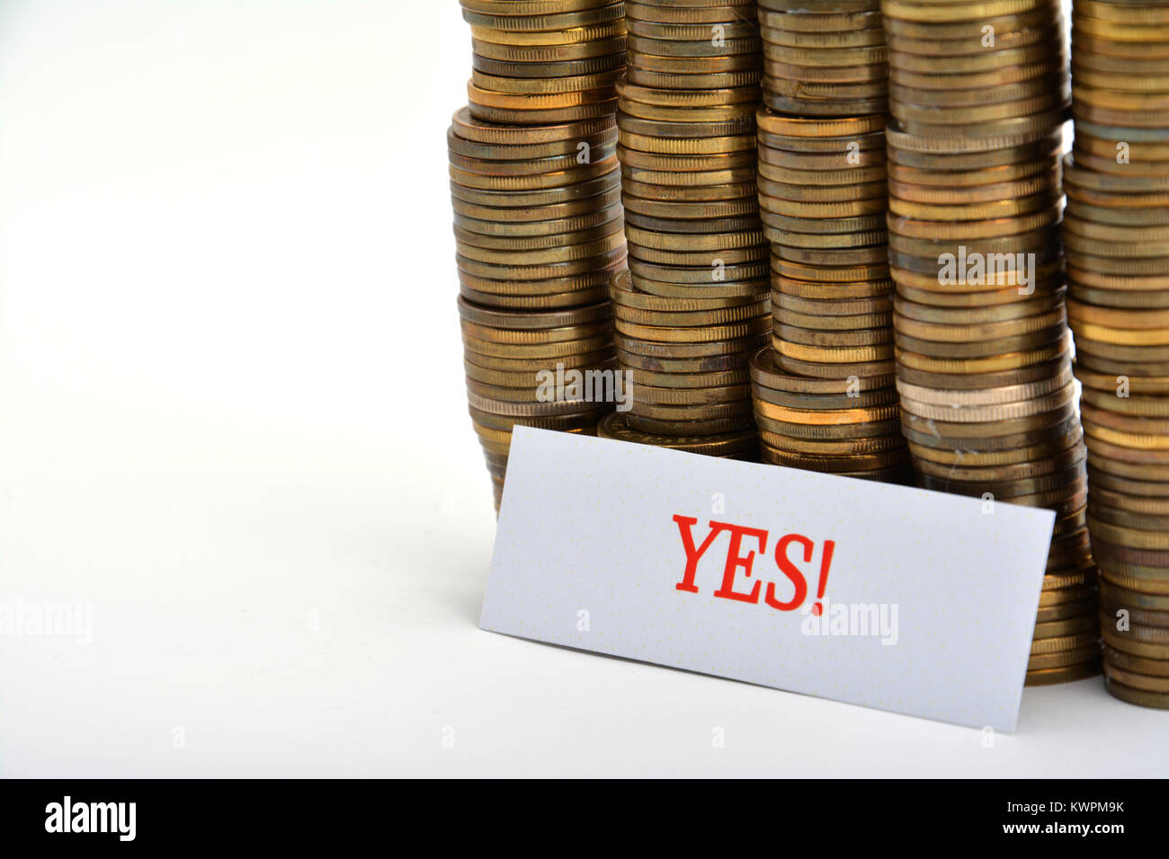 Word yes with coins isolated on white background Stock Photo - Alamy