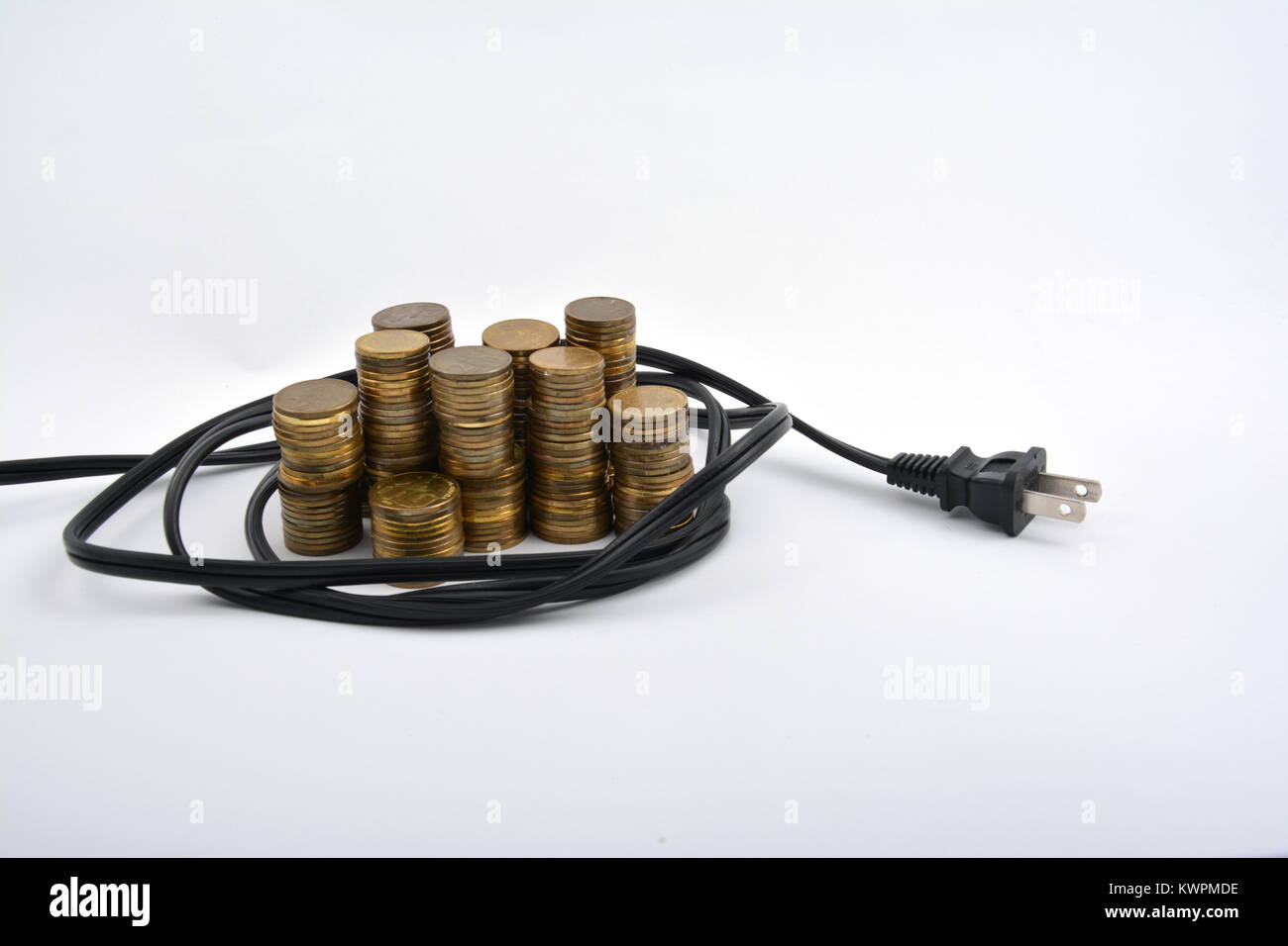 Electric cable with coins isolated on white background Stock Photo - Alamy