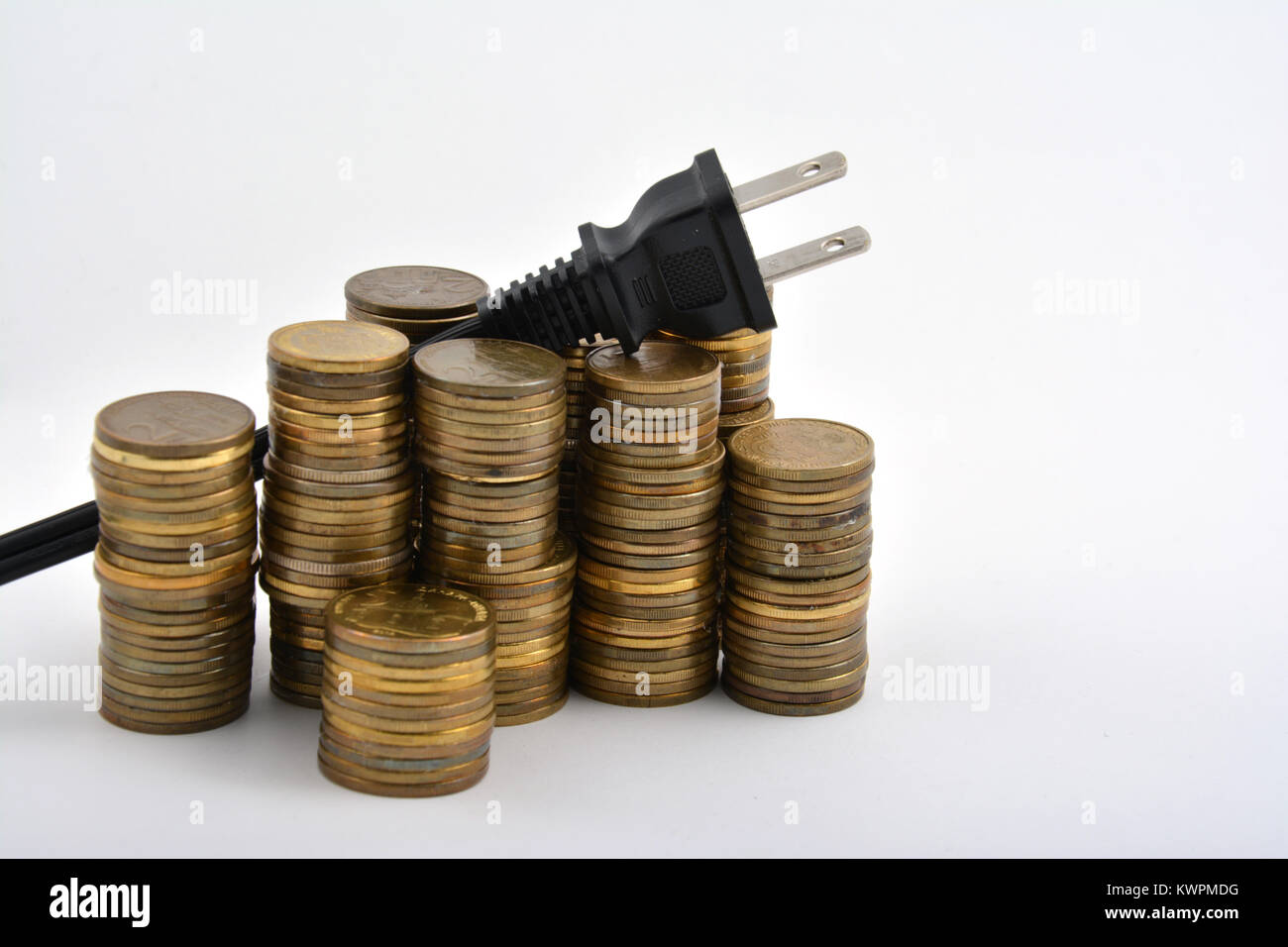 Electric cable with coins isolated on white background Stock Photo - Alamy