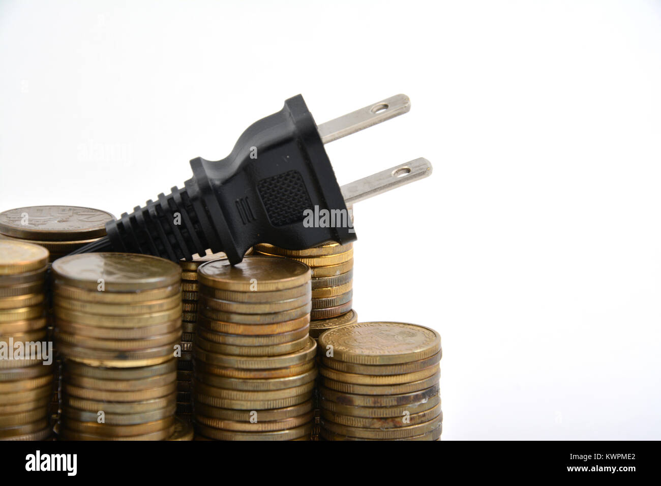 Electric cable with coins isolated on white background Stock Photo - Alamy