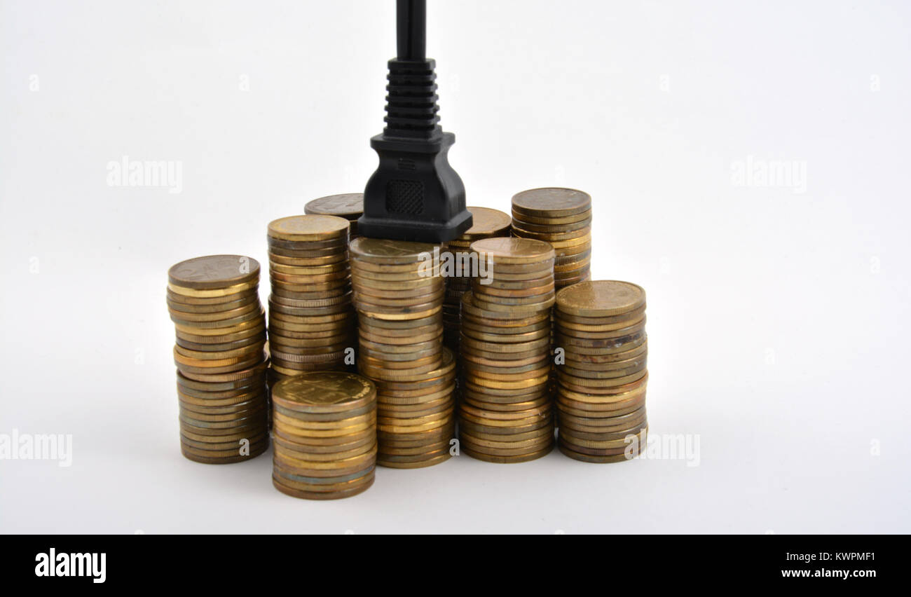 Electric cable with coins isolated on white background Stock Photo - Alamy