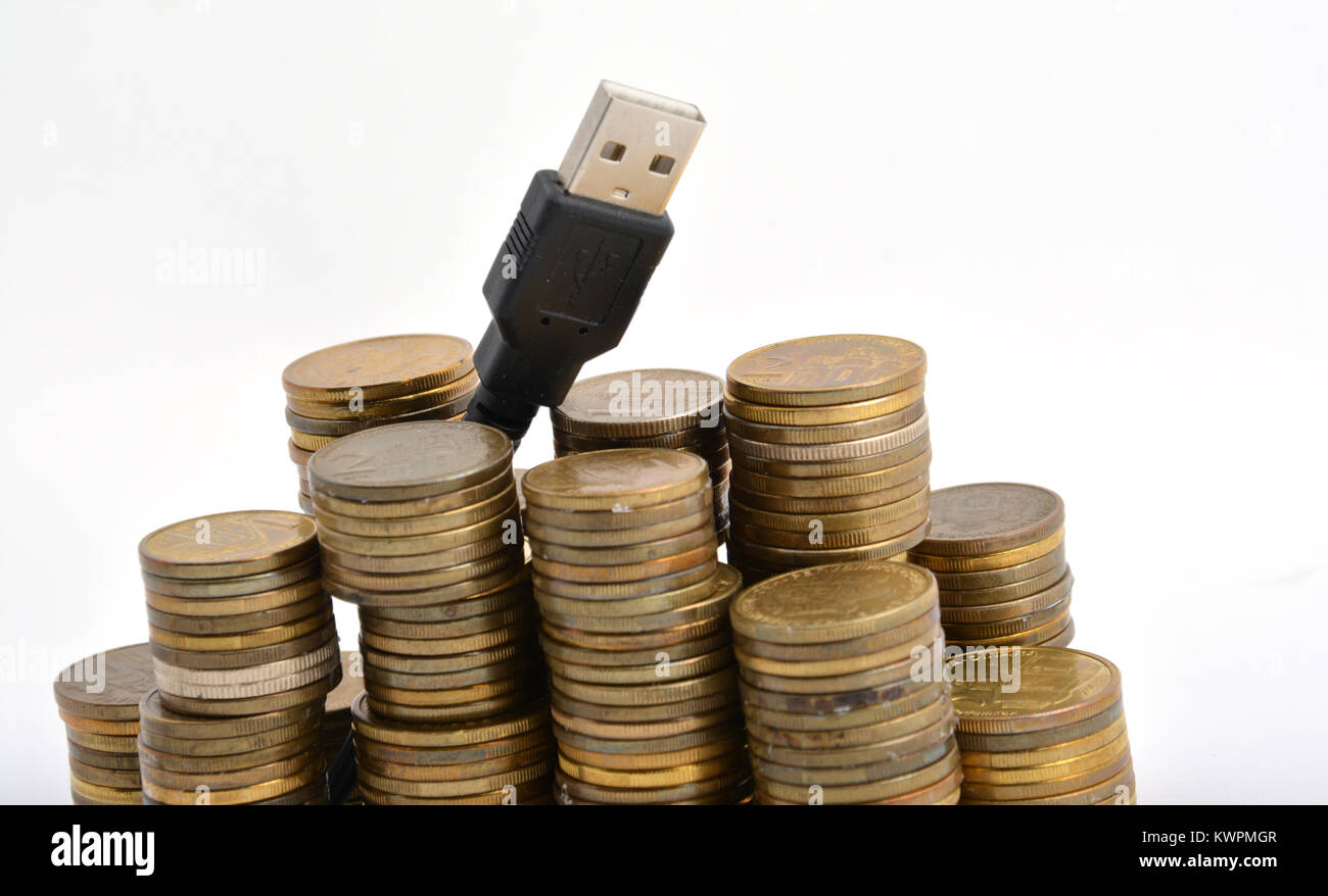 USB cable with coins isolated on white background Stock Photo - Alamy