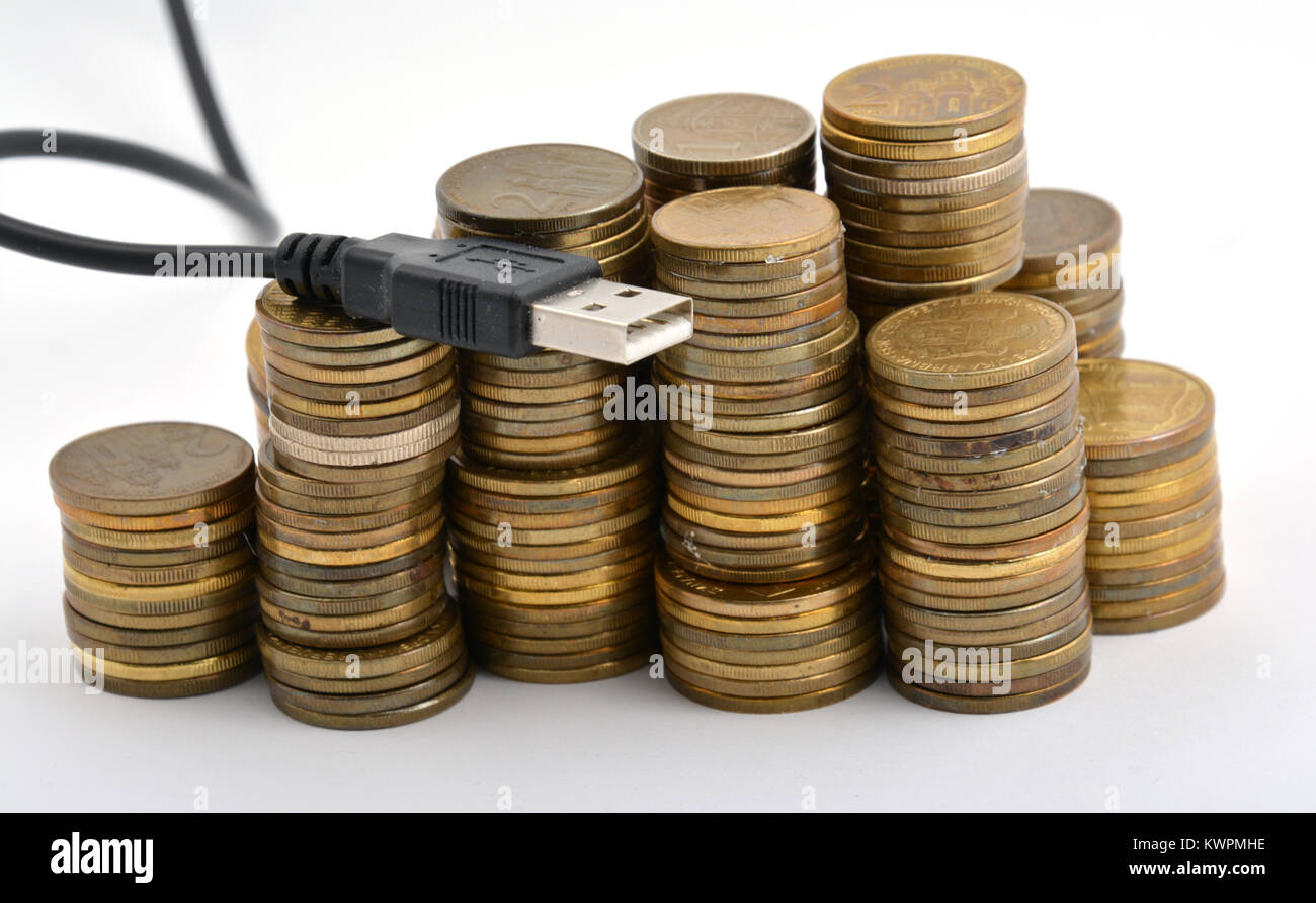 USB cable with coins isolated on white background Stock Photo - Alamy
