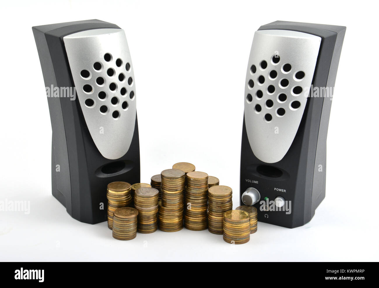 Speakers with coins isolated on white background Stock Photo - Alamy