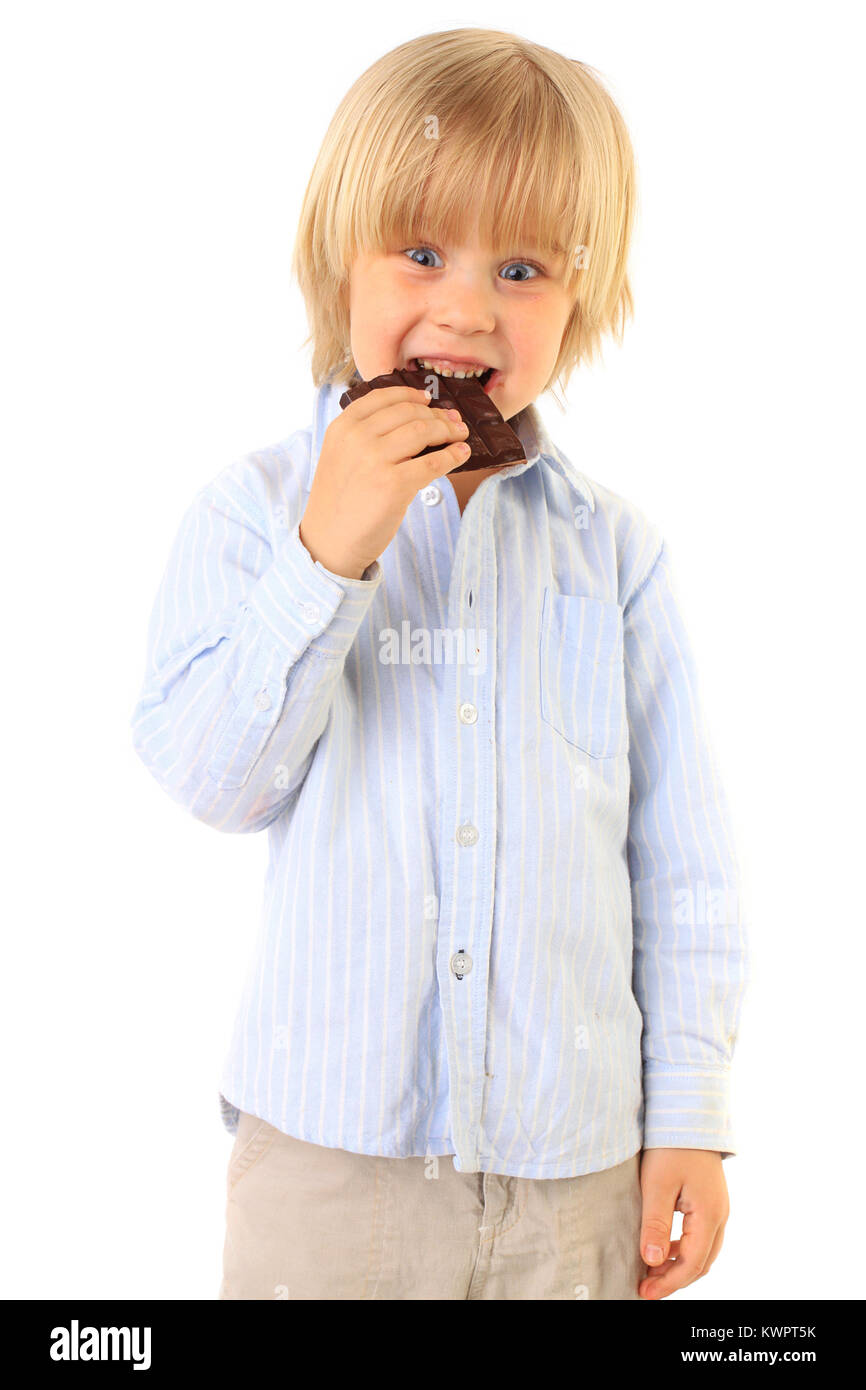 happy kid eating chocolate Stock Photo - Alamy
