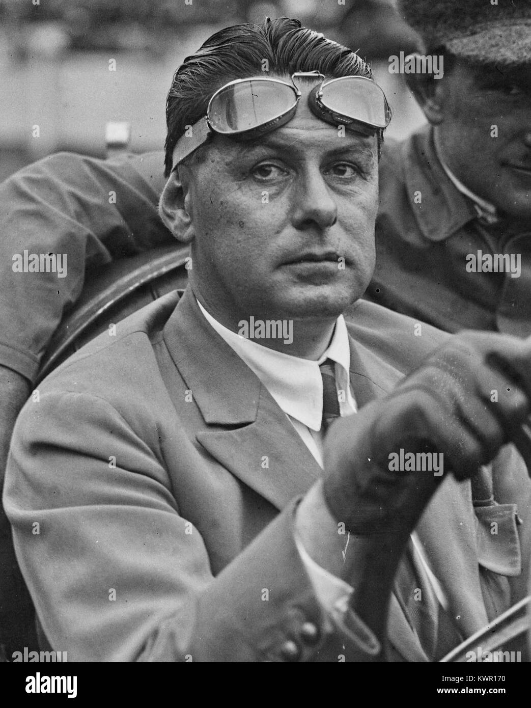 A cropped photograph of Émile Mathis during the 1921 French Grand Prix ...