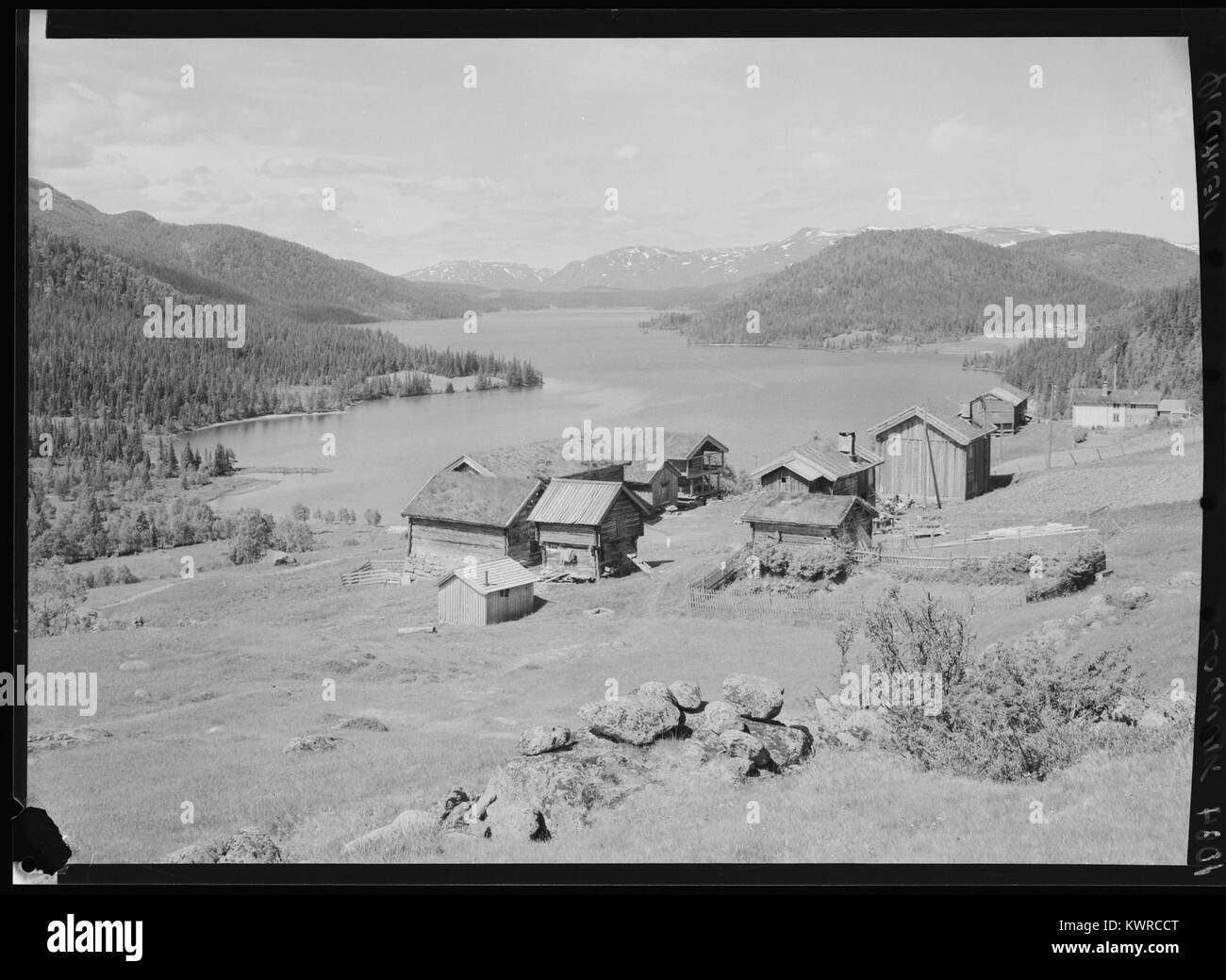 The photograph ‘Lognvik’ in Norway presents a rural coastal village ...