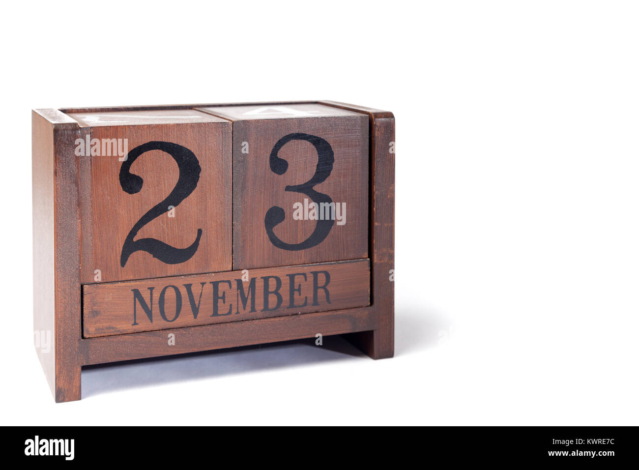Wooden Perpetual Calendar set to November 23rd Stock Photo - Alamy