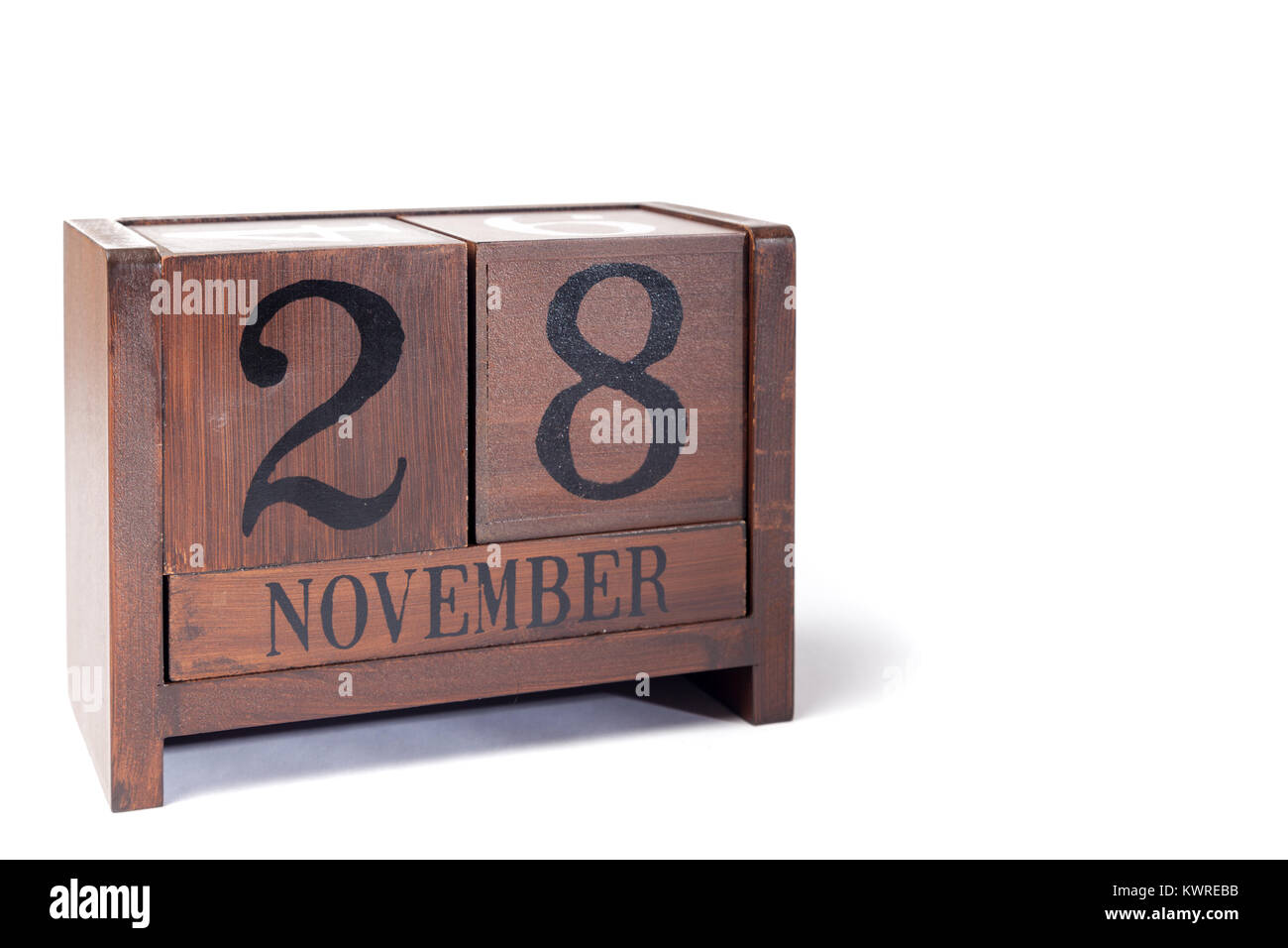 Wooden Perpetual Calendar set to November 28th Stock Photo - Alamy