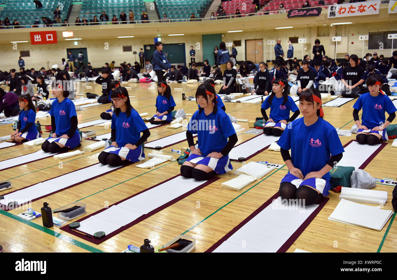 Tokyo, Japan. 5th Jan, 2018. Participants ink their mottoes with bold ...