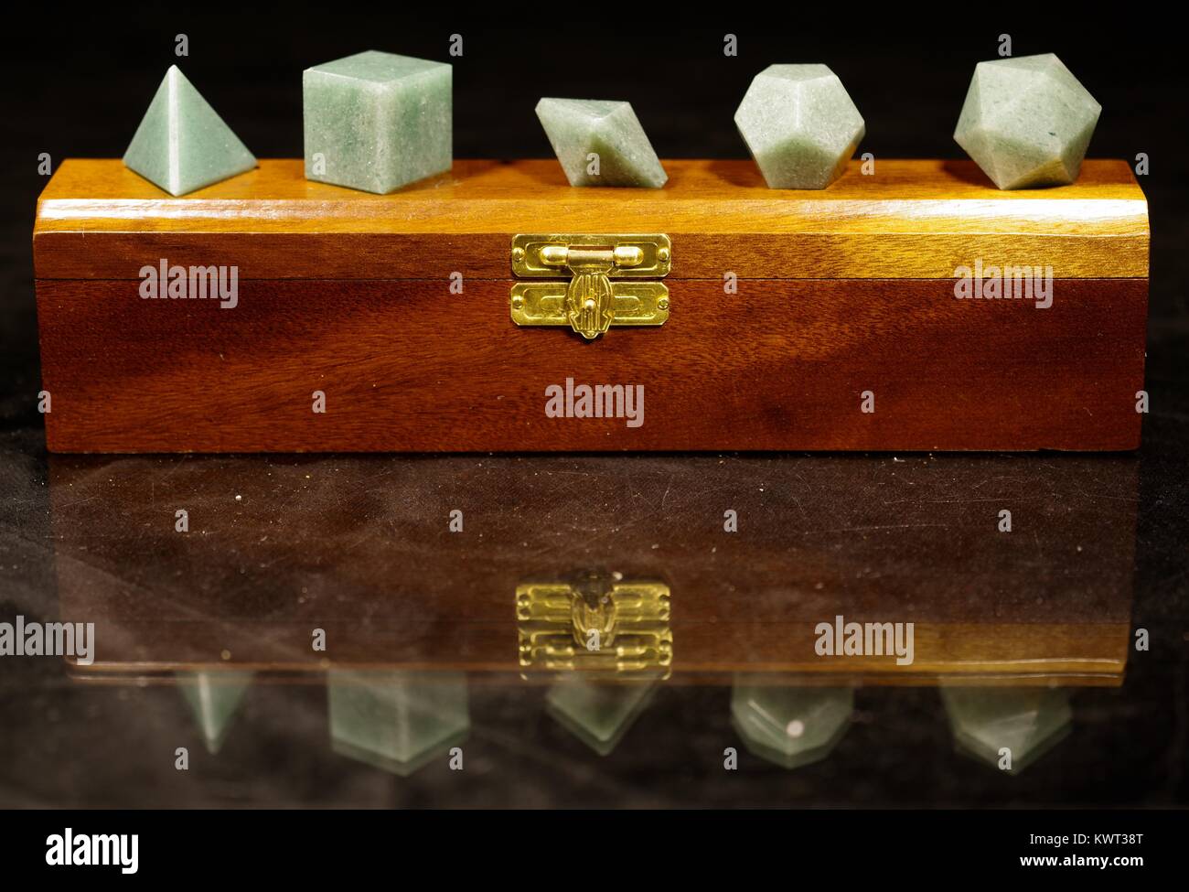 Wooden Display Box of Geometric Crystal Platonic Solids. Representing ...