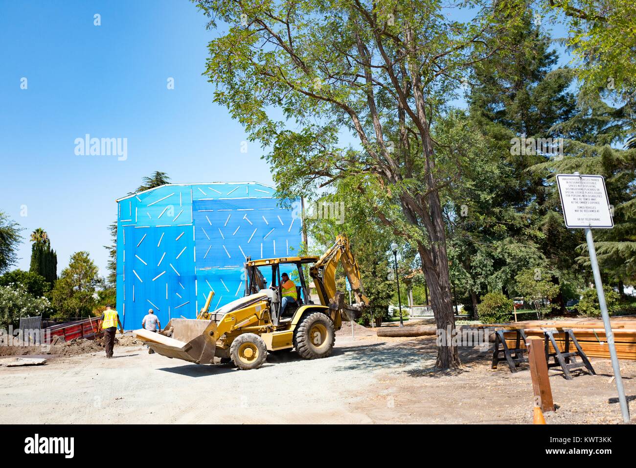 Construction site with backhoe construction equipment and partially ...