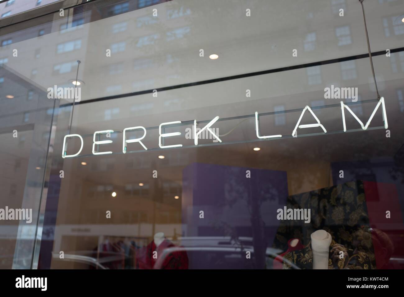 Sign in store window of the Derek Lam upscale clothing boutique on ...